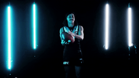 Aussie Rules Football Handball GIF by Port Adelaide FC - Find & Share ...