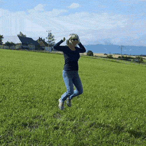 Girl Running In Field