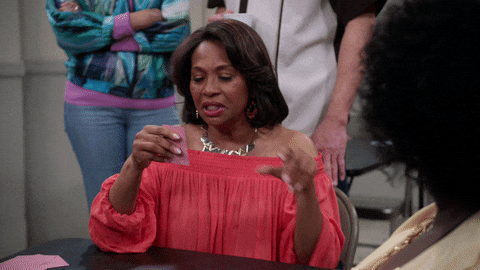 People Playing Spades Talking Trash