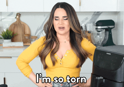 Im So Torn GIFs - Get the best GIF on GIPHY