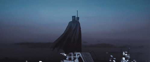 GIF of Batman standing on tower with his rifle? : r/DC_Cinematic