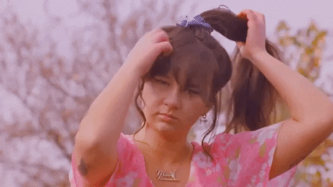 Sassy Ponytail GIF by Mallrat - Find & Share on GIPHY